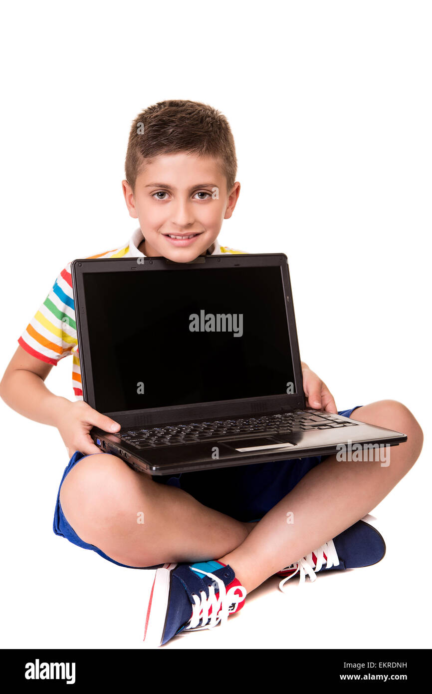 Cute blond boy using a personal computer Stock Photo - Alamy