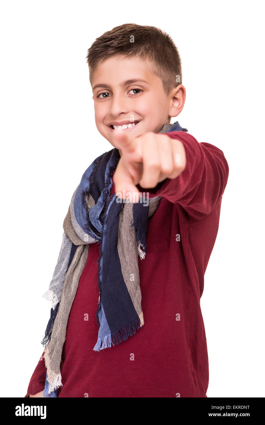 Young boy pointing front over white background Stock Photo - Alamy
