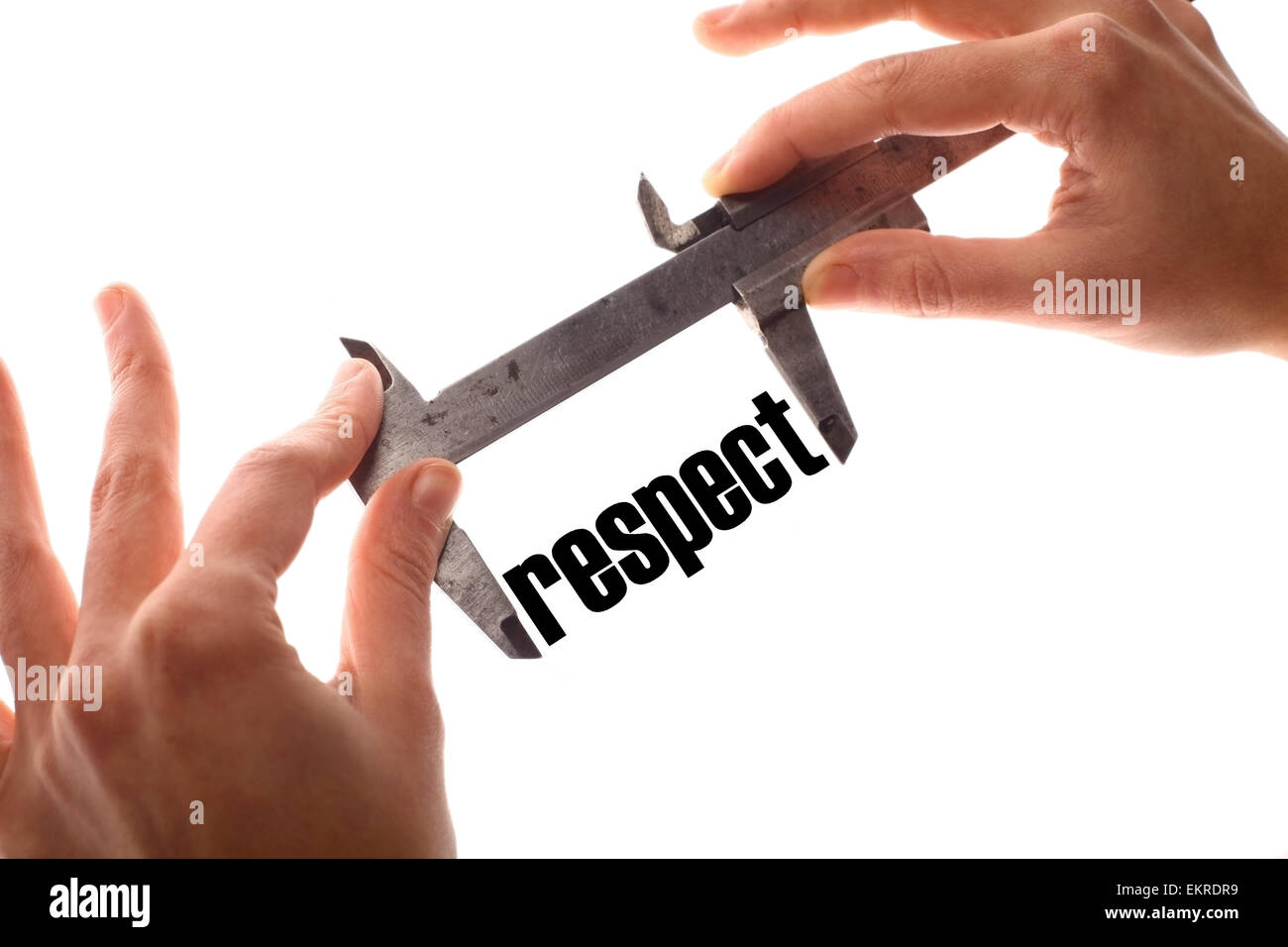 Color horizontal shot of two hands holding a caliper and measuring the ...
