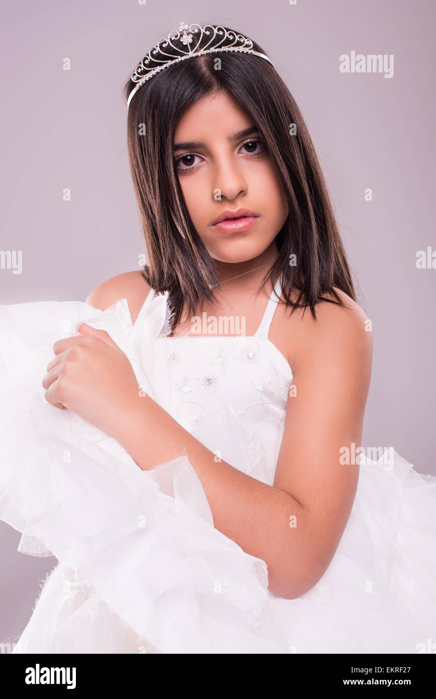 Little girl wearing princess fantasy over soft pink background Stock ...