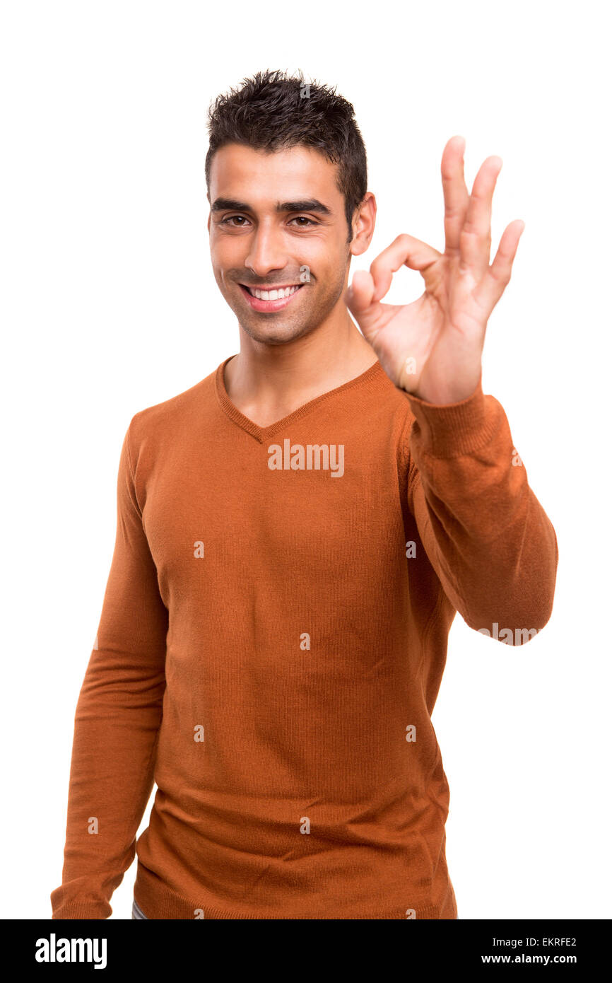 Smiling guy showing Ok sign Stock Photo - Alamy