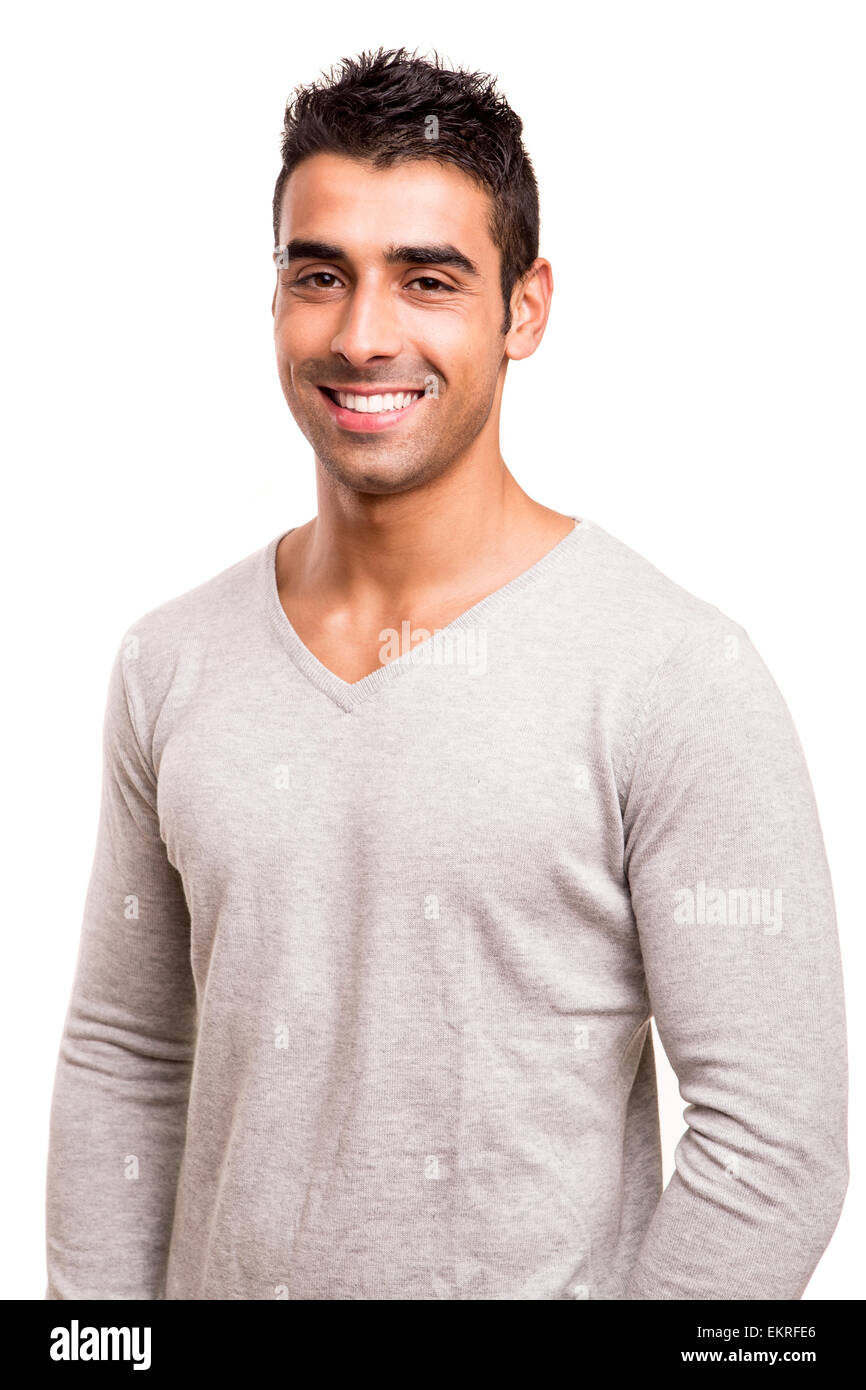 Smiling guy posing over white background Stock Photo - Alamy