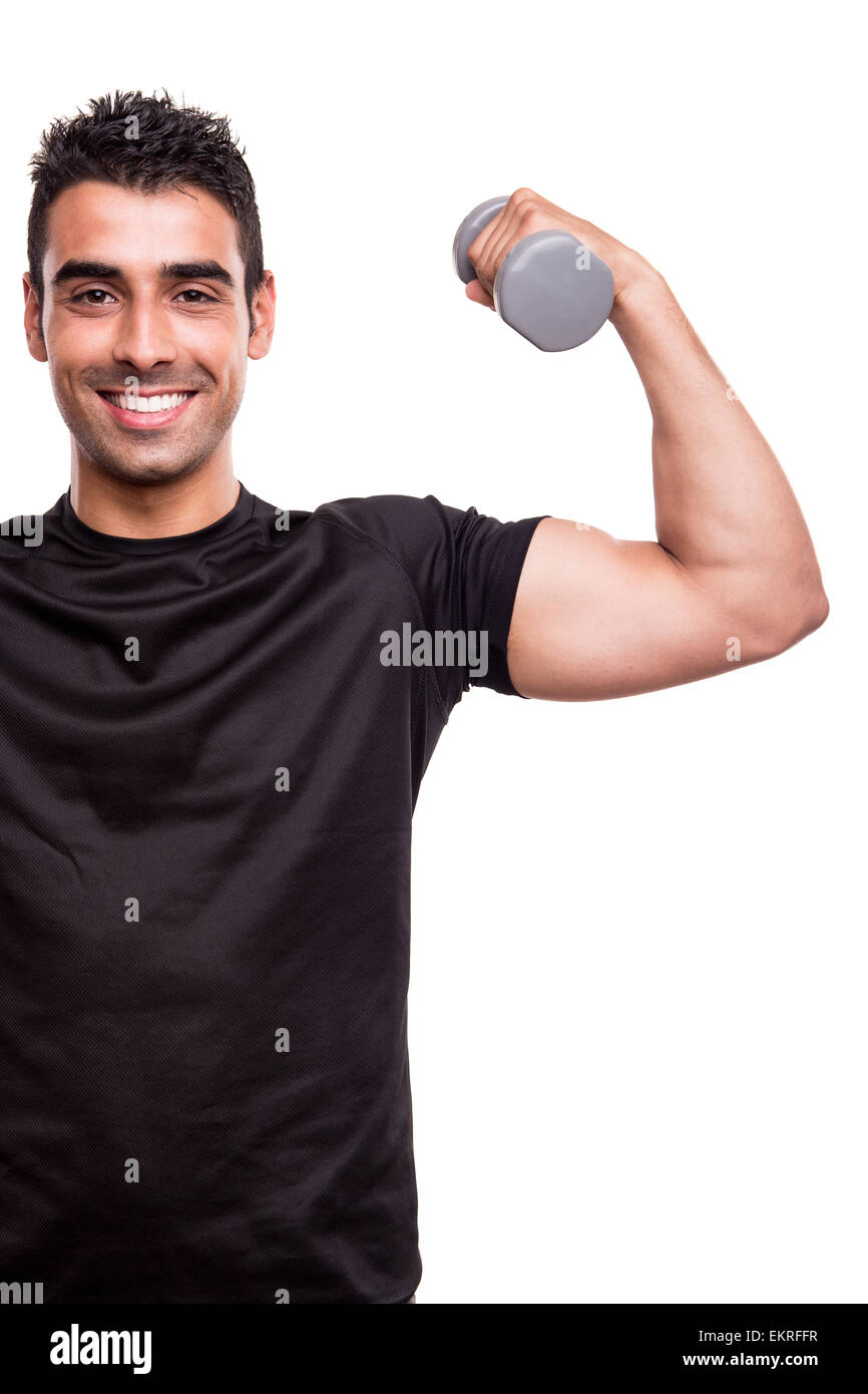 Smiling man lifting weights over white background Stock Photo - Alamy