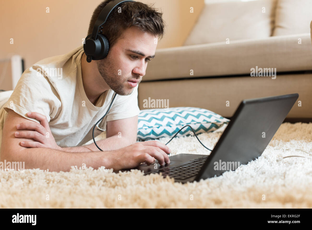 Man lying on the floor hi-res stock photography and images - Alamy