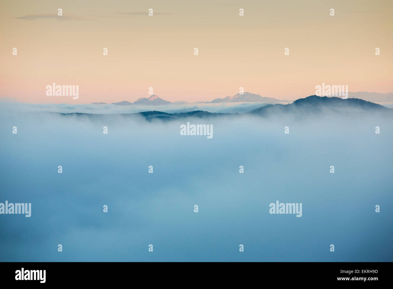 Morning Mist spilling down from the plateau into the lower shire river ...