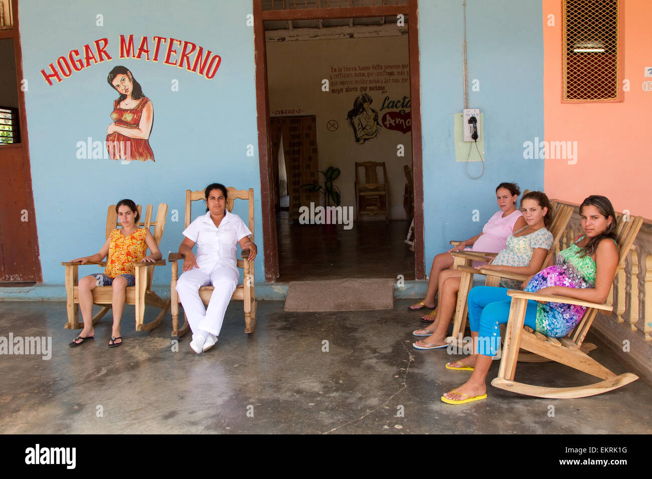 Expectant mothers sit on a porch of a maternity unit in Vinales,Cuba ...