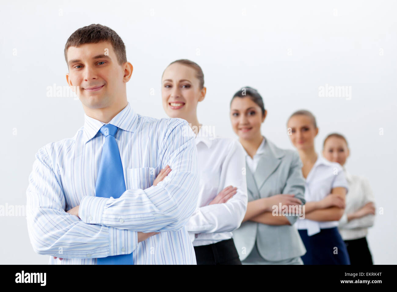 Group of business people standing in row Stock Photo - Alamy