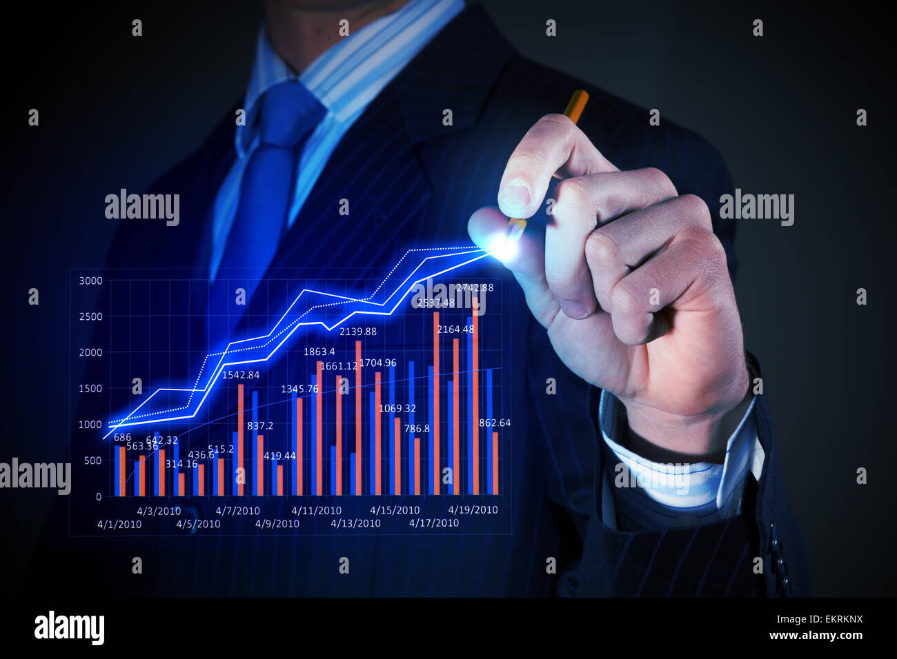 Business man drawing graphics Stock Photo - Alamy