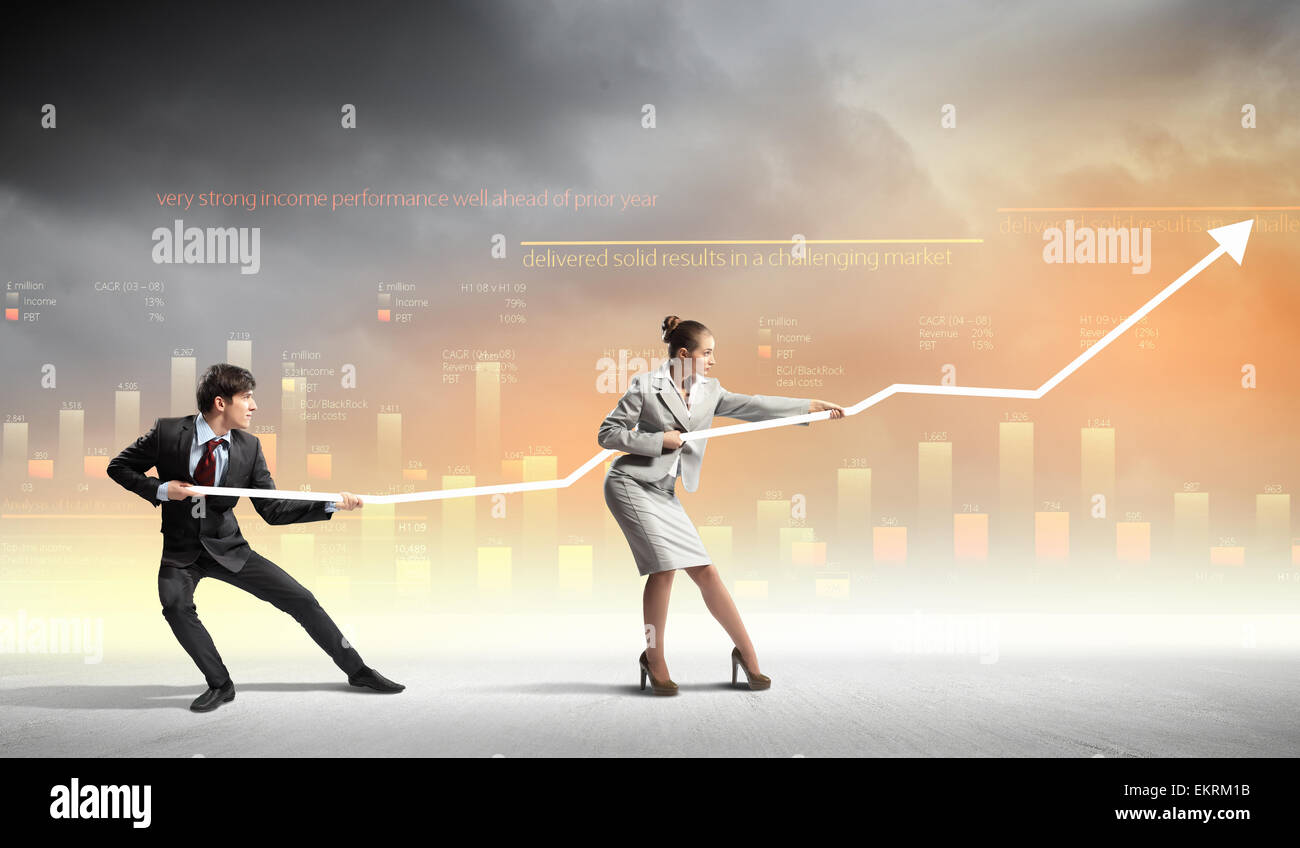 Businesspeople pulling graph Stock Photo - Alamy