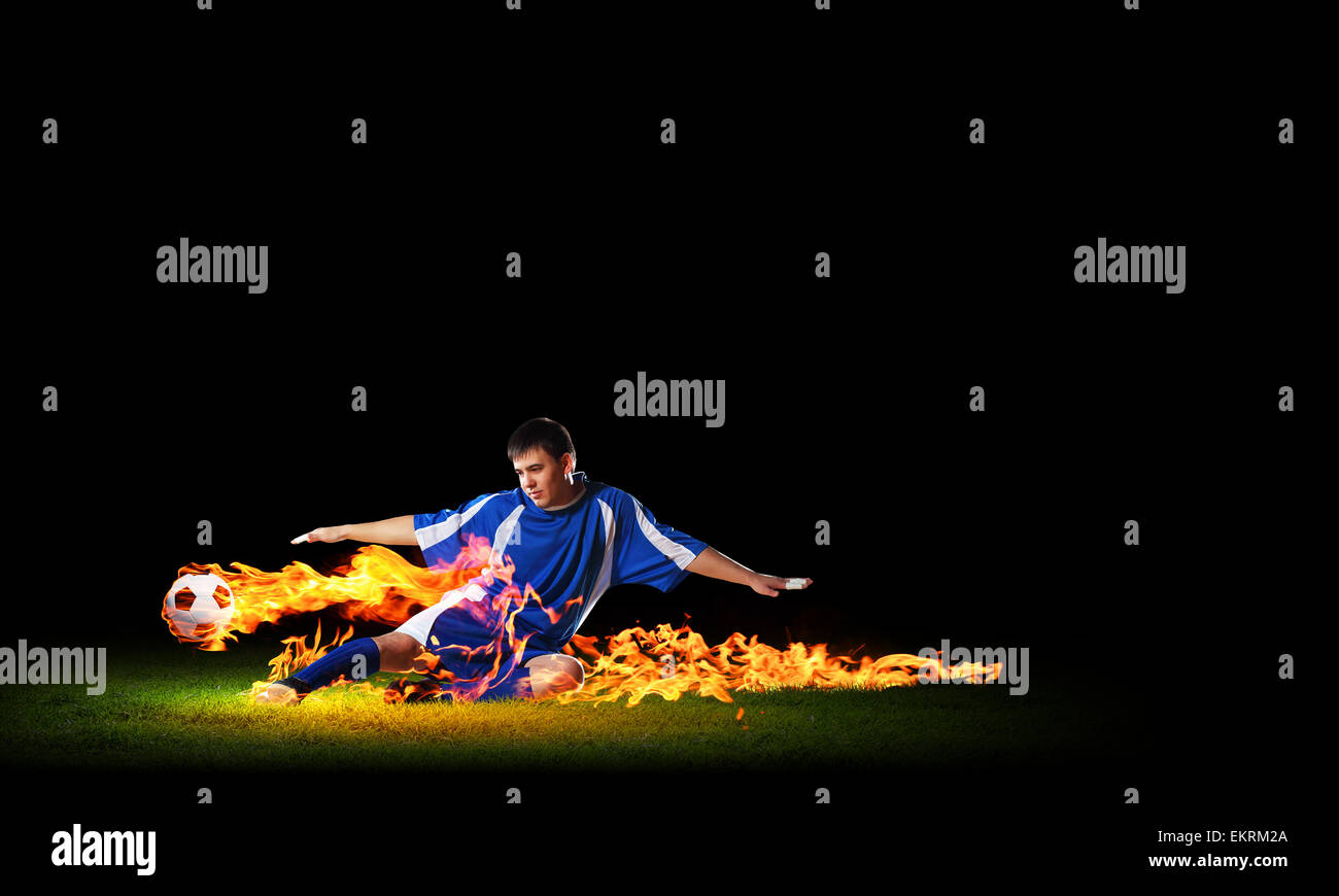 Football player with ball Stock Photo - Alamy