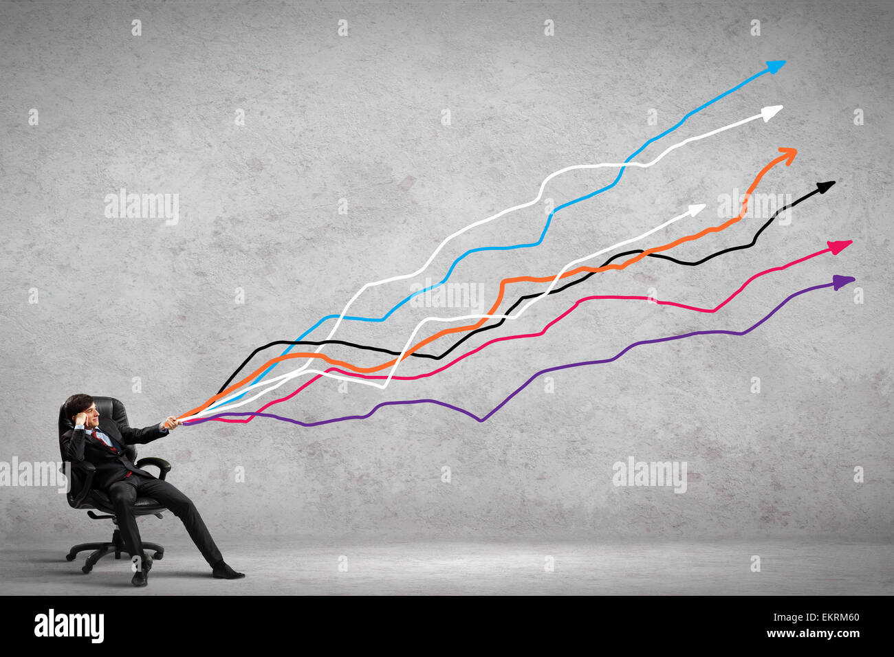 Businessman pulling graph Stock Photo - Alamy