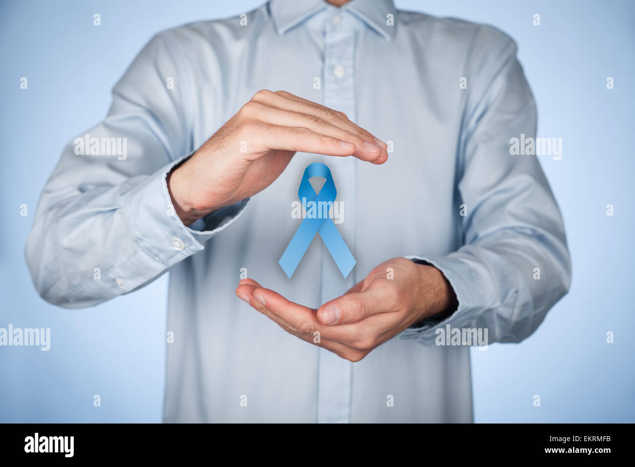 Prostate cancer awareness - man with protective and support gesture and ...