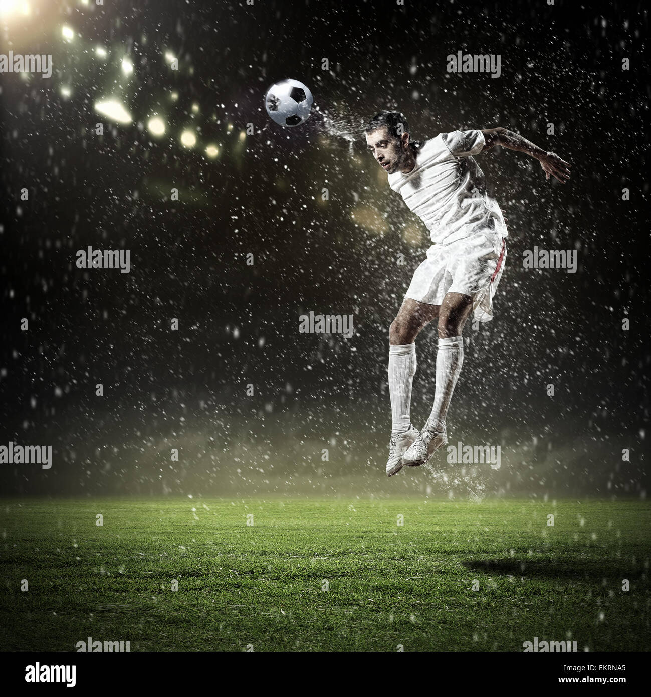 Football player hitting ball head hi-res stock photography and images ...