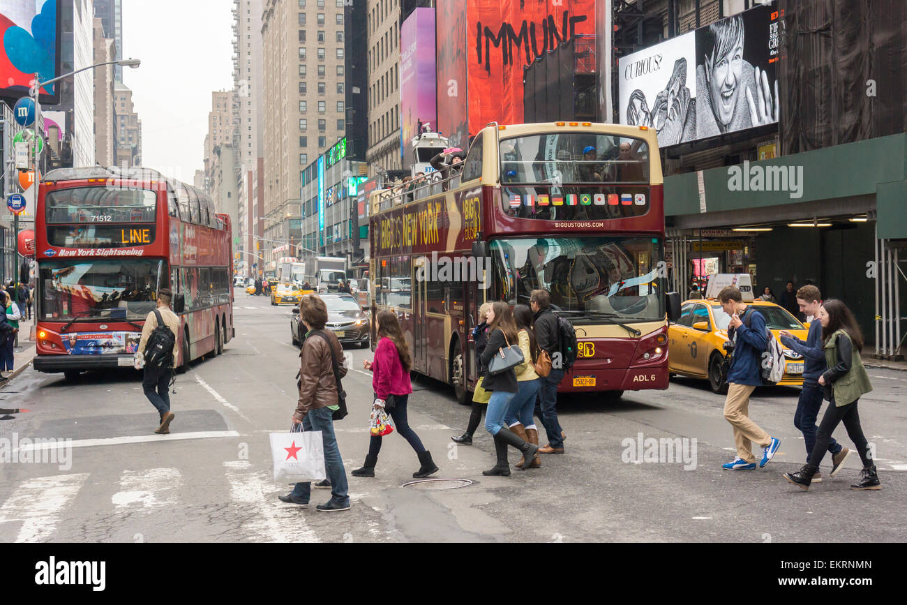 Tour buses at a crosswalk in Times Square in New York on Friday, April ...
