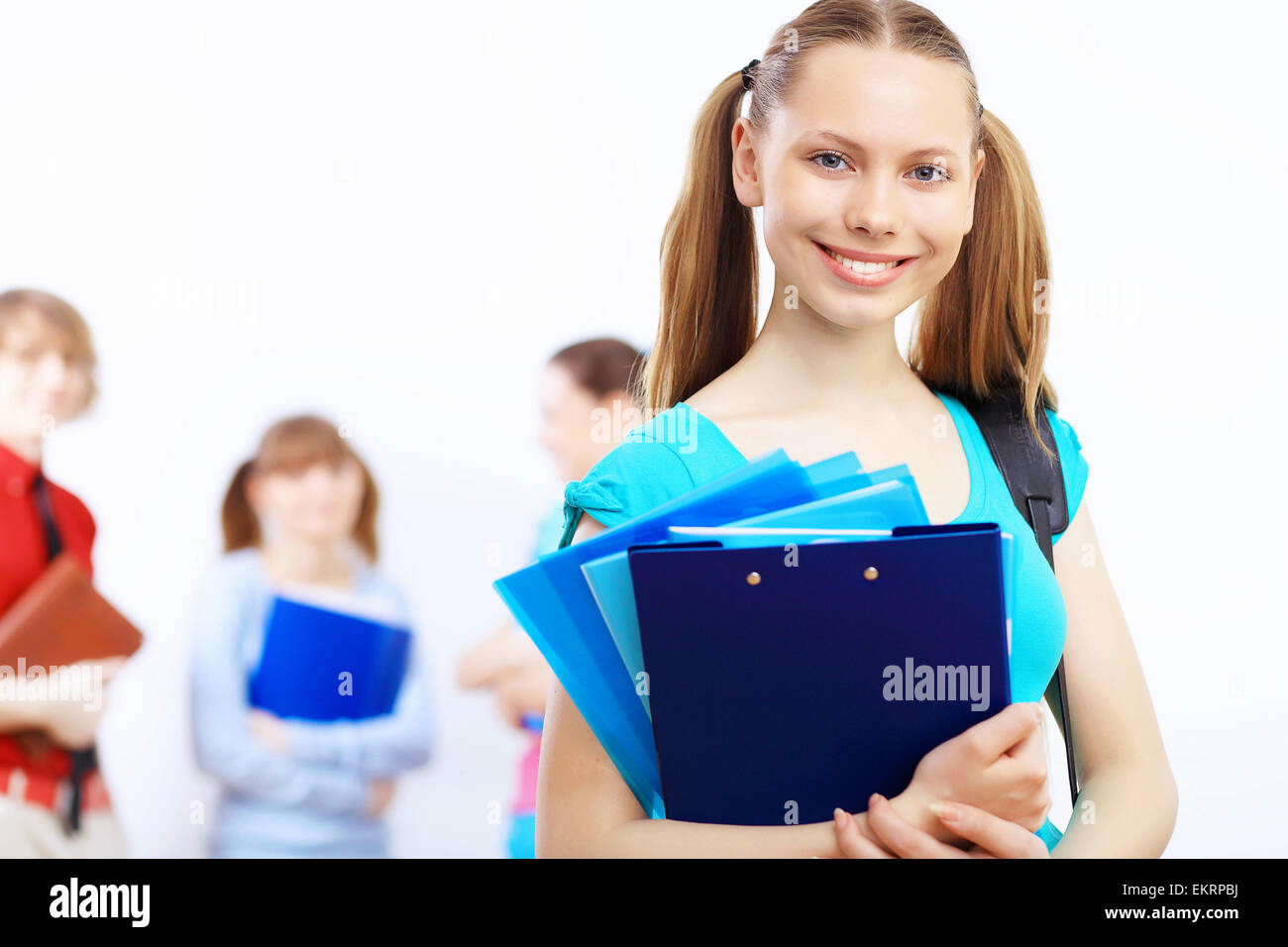 Student with books Stock Photo - Alamy