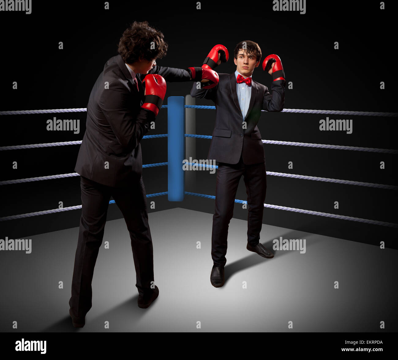 Two young businessman boxing Stock Photo - Alamy