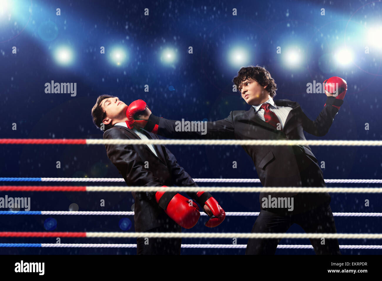 Two young businessman boxing Stock Photo - Alamy