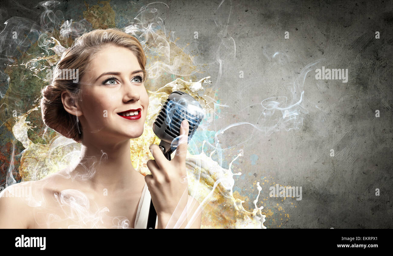 Female blonde singer Stock Photo - Alamy