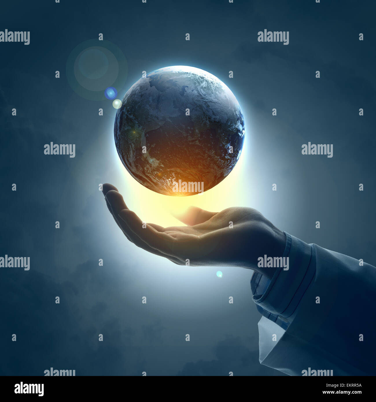 Image of earth planet on hand Stock Photo - Alamy