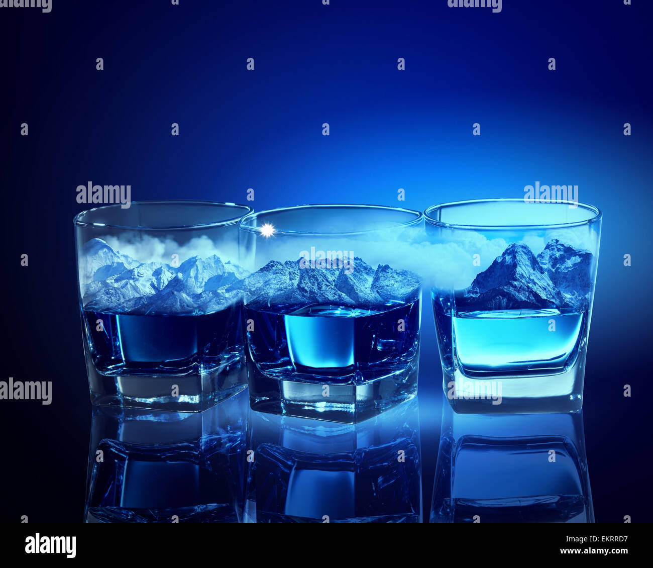 Three glasses of blue liquid Stock Photo - Alamy