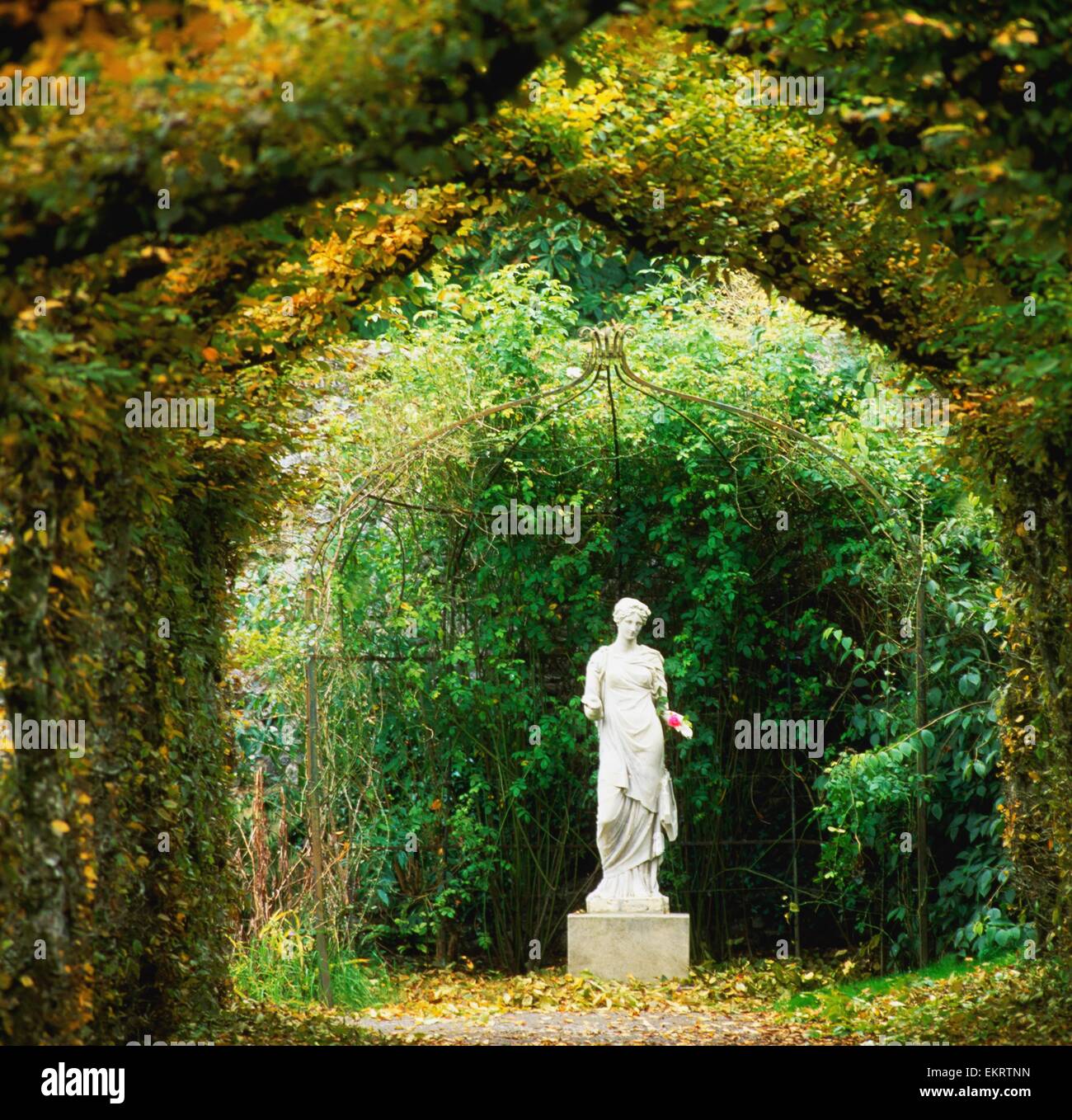 Statue In Forest Glade Stock Photo - Alamy