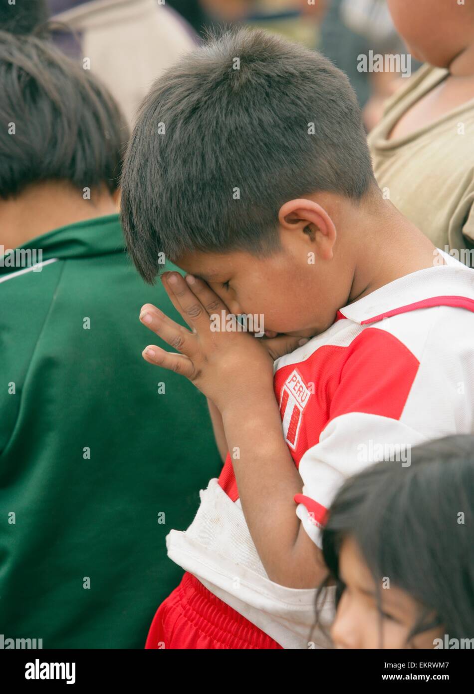 Child Praying, Lima, Peru Stock Photo - Alamy