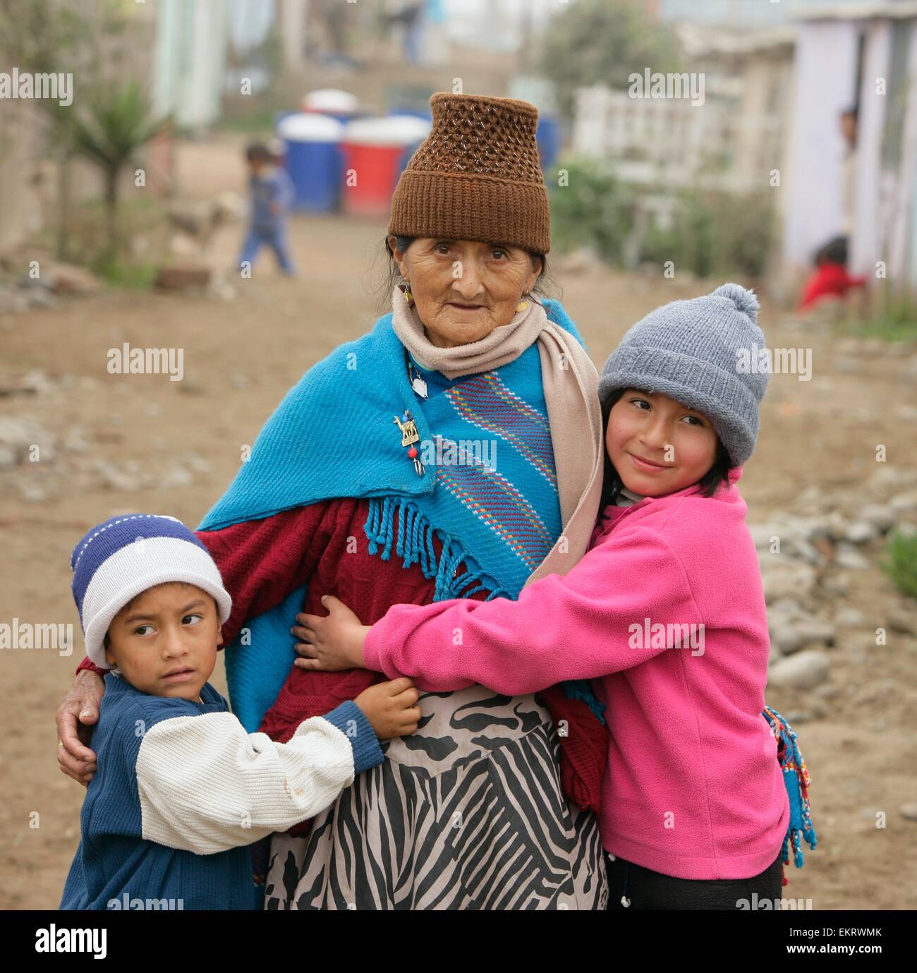 Children Hugging Senior Woman, Lima, Peru Stock Photo - Alamy