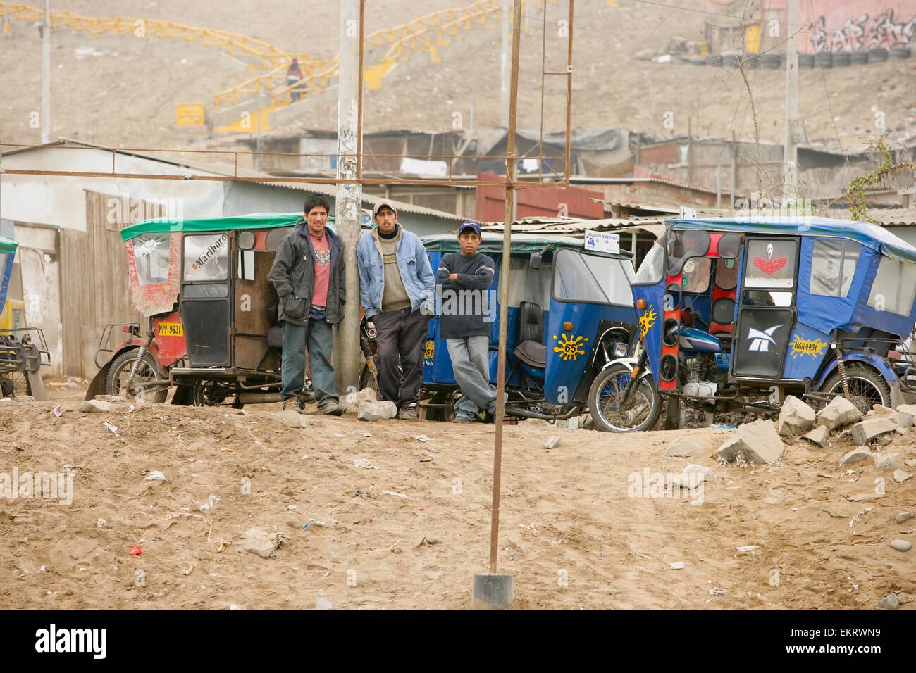 Men Standing By Vehicles, Lima, Peru Stock Photo - Alamy