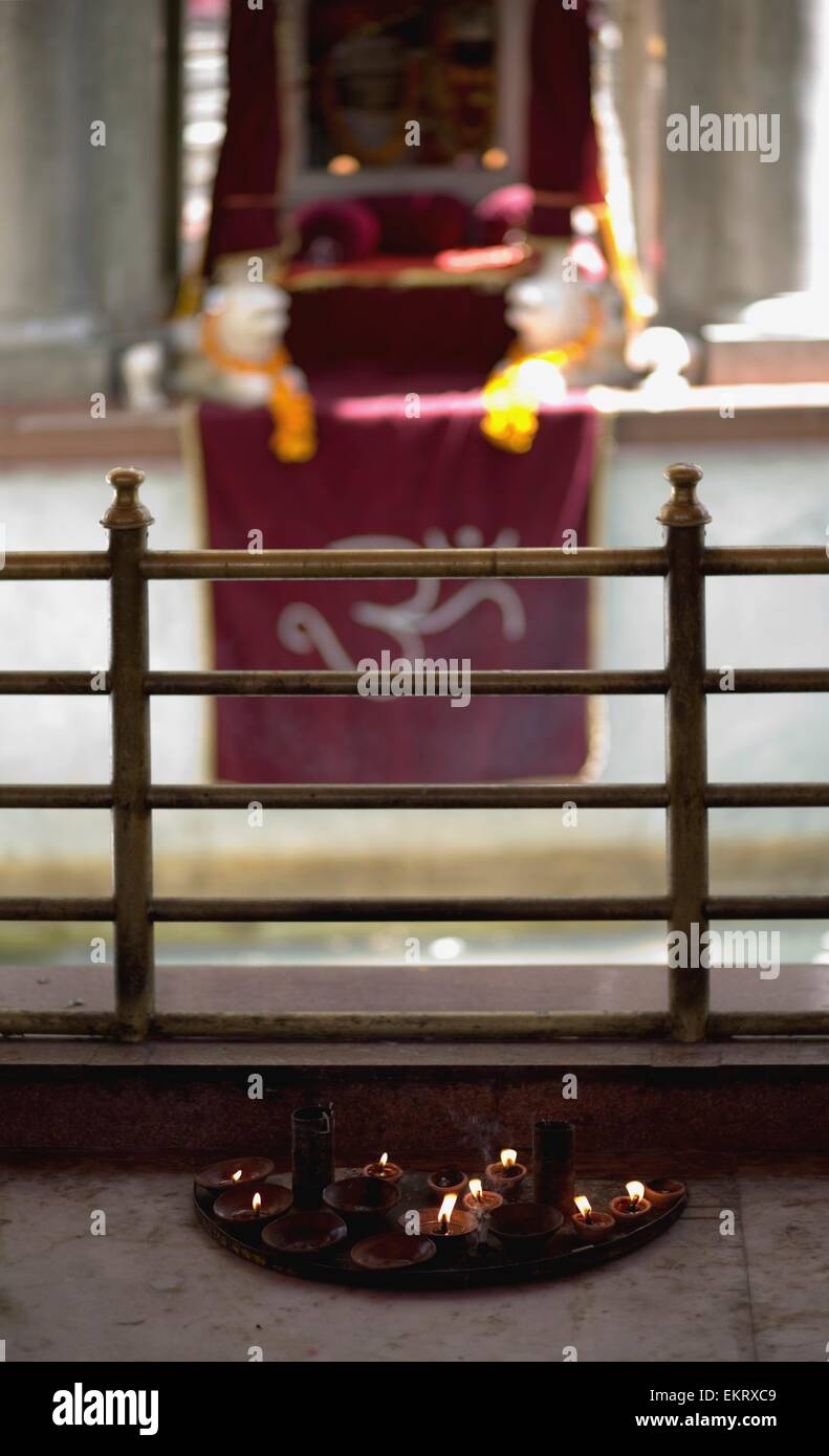 Lit Candles In Temple Stock Photo - Alamy