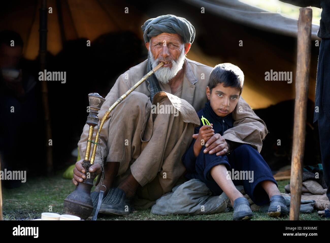 Pipe smoking boy hi-res stock photography and images - Alamy