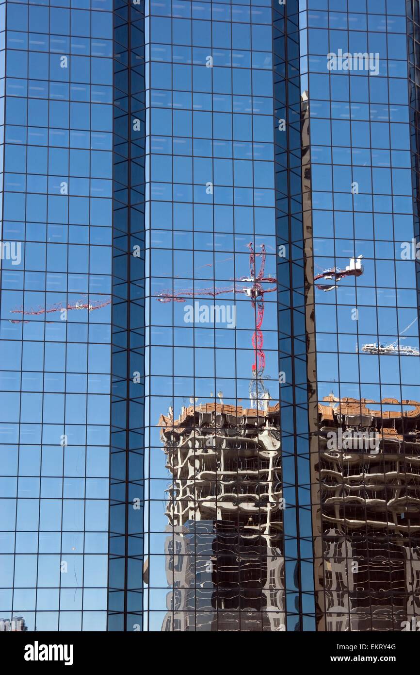 Calgary, Alberta, Canada; Glass Building Reflecting A Construction ...