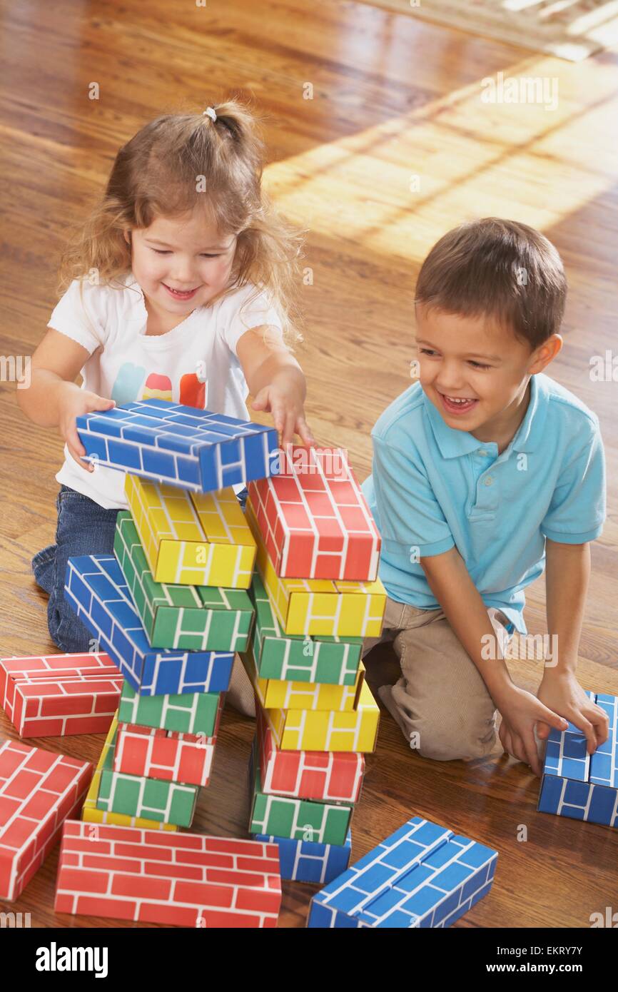 Children Playing With Building Blocks Stock Photo - Alamy