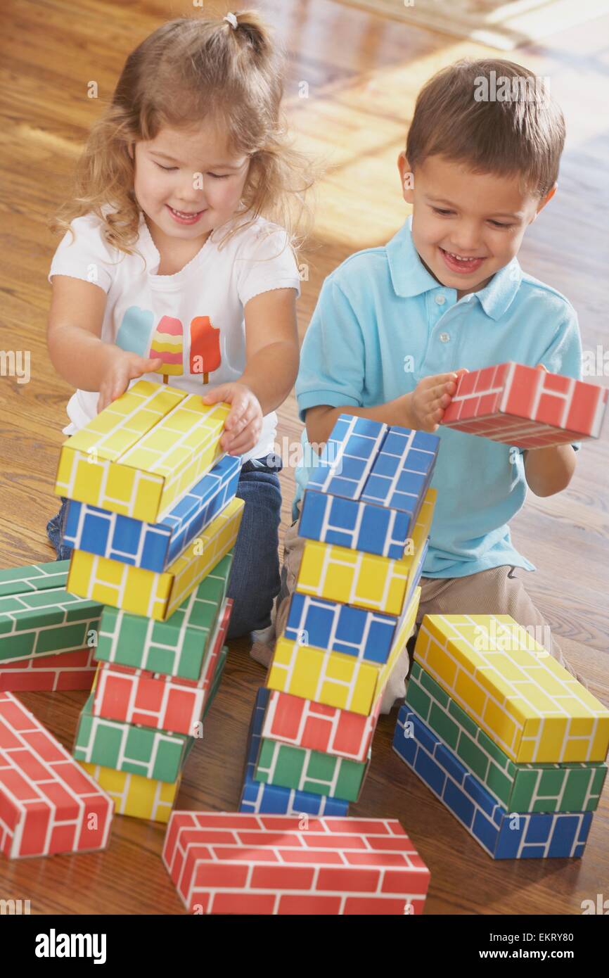 Children Playing With Building Blocks Stock Photo - Alamy