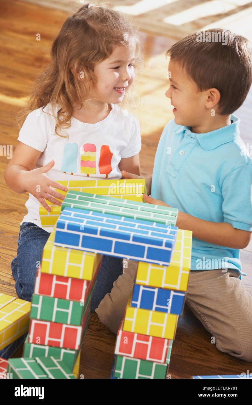 Children Playing With Building Blocks Stock Photo - Alamy