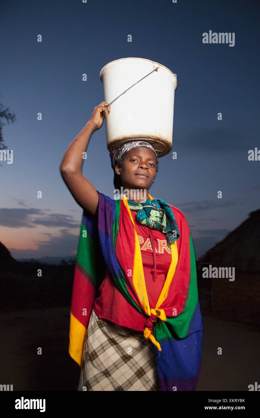 Carrying water pails hi-res stock photography and images - Alamy