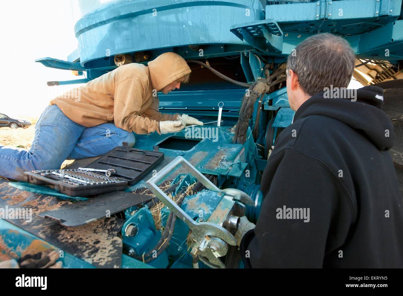 Mechanic working on farm equipment hi-res stock photography and images ...