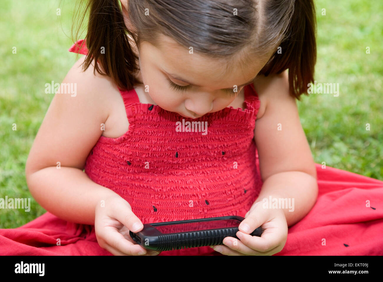 Artist Choice: Young Chinese-Canadian Girl Checking Her Text Messages ...