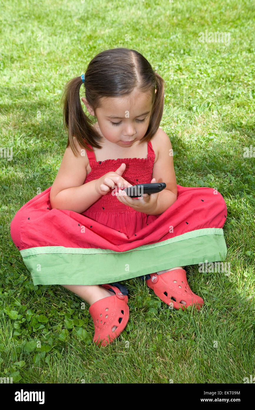 Artist Choice: Young Chinese-Canadian Girl Texting On Her Smart Phone ...