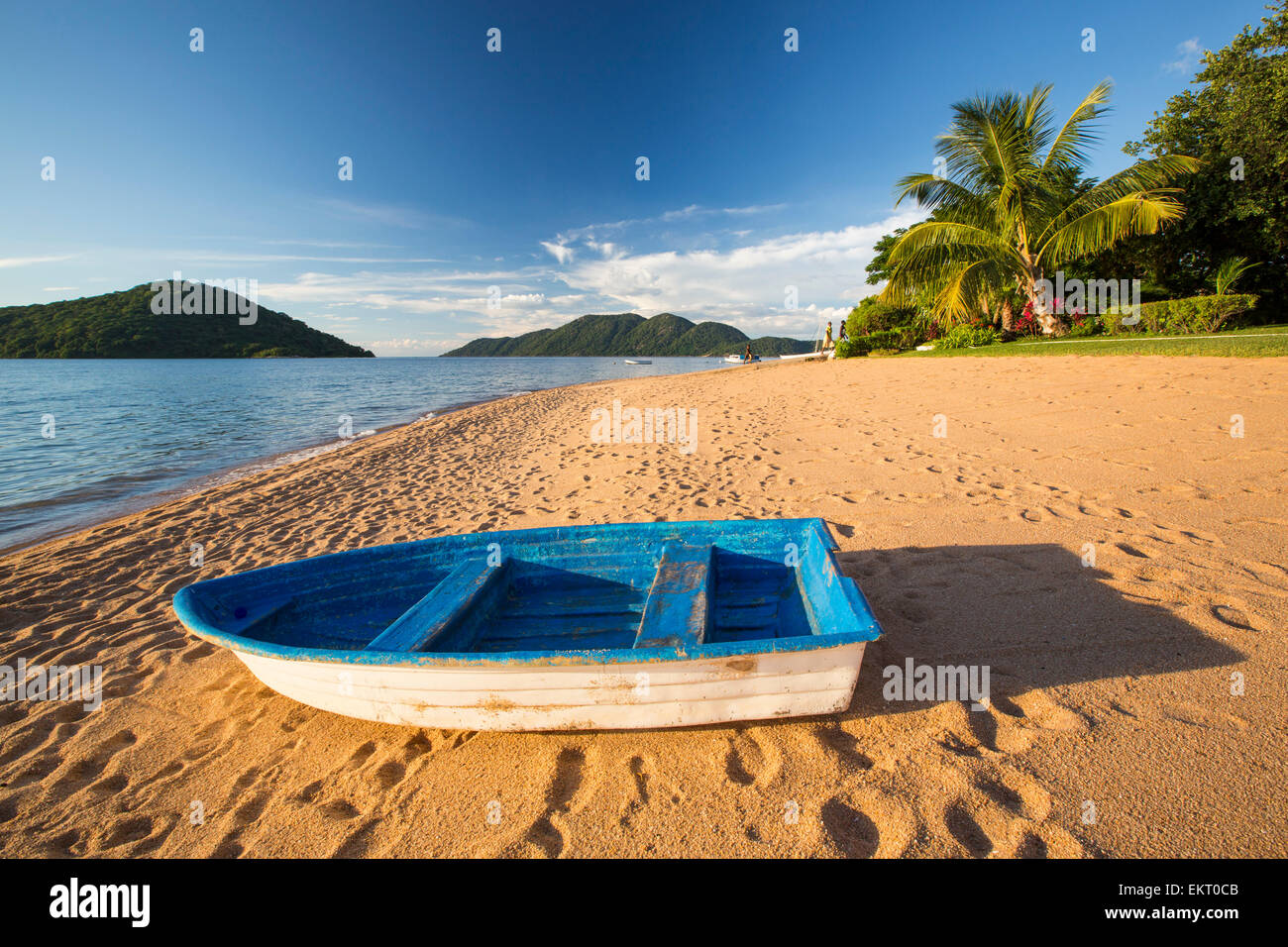 A boat on a beach at Cape Maclear on the shores of Lake Malawi, Malawi ...