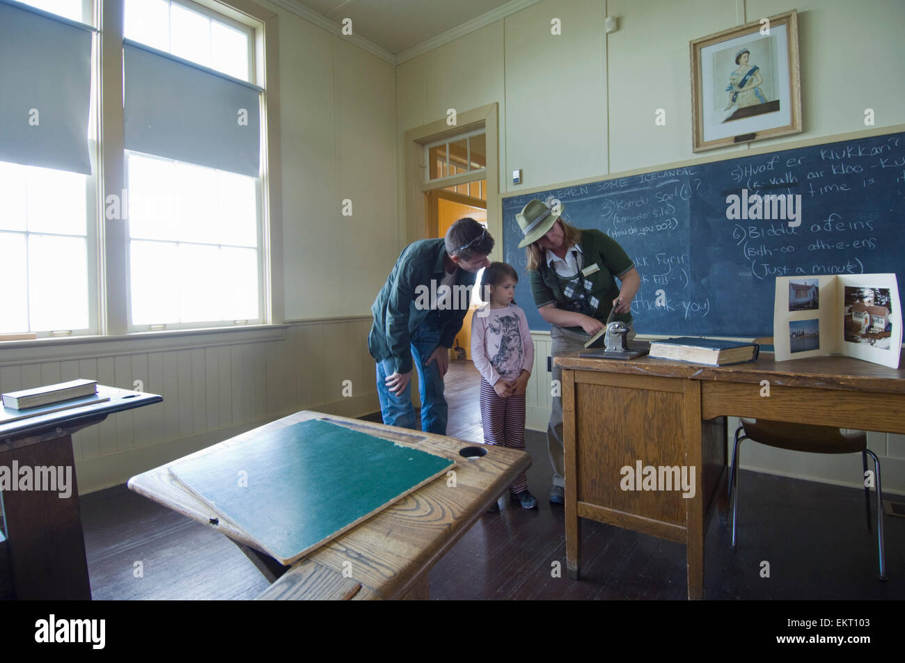 Father With His Young Daughter And A Tour Guide In The Hecla School ...