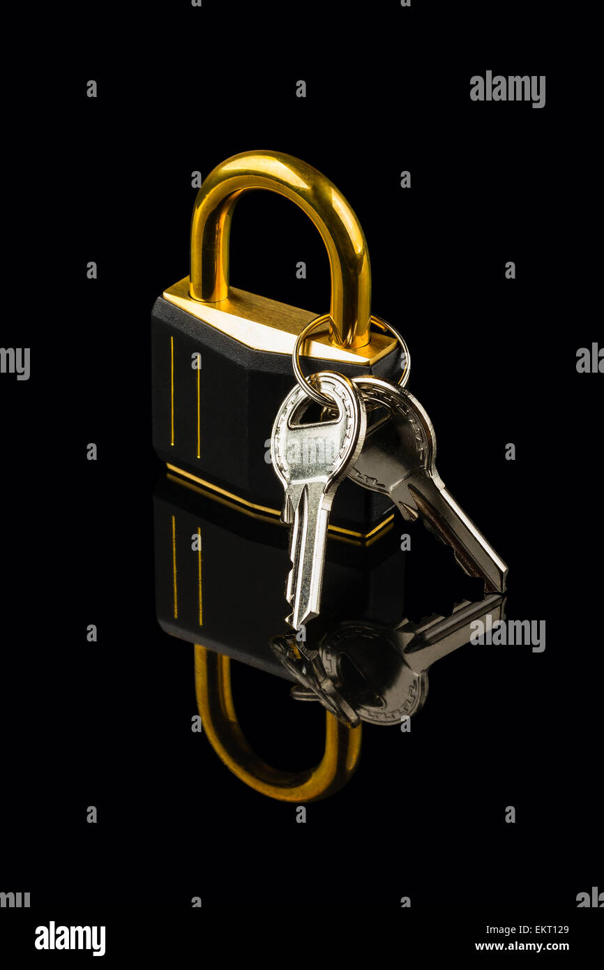 hinged lock with keys on black background Stock Photo - Alamy