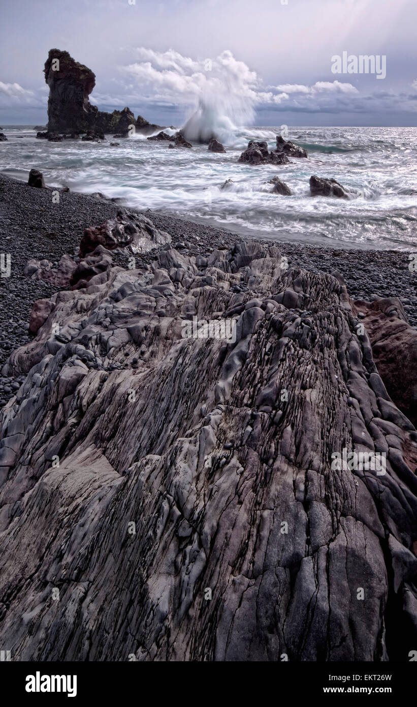 Large wave hitting the rocks at Djupalonssandur beach, Snaefellsnes ...