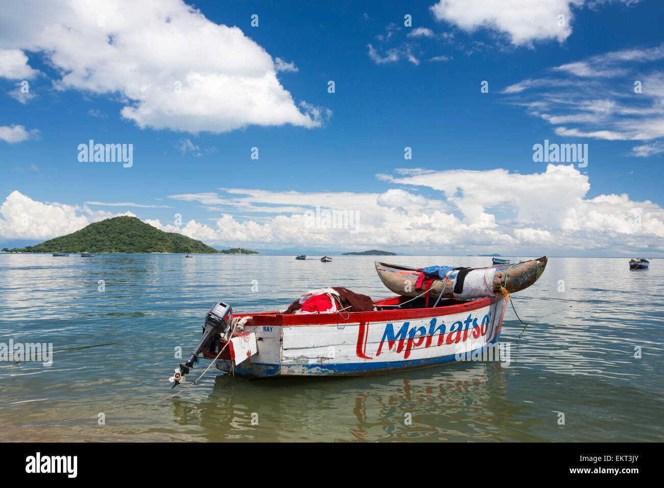 Traditional dug out canoe and fishing boats at Cape Maclear on the ...
