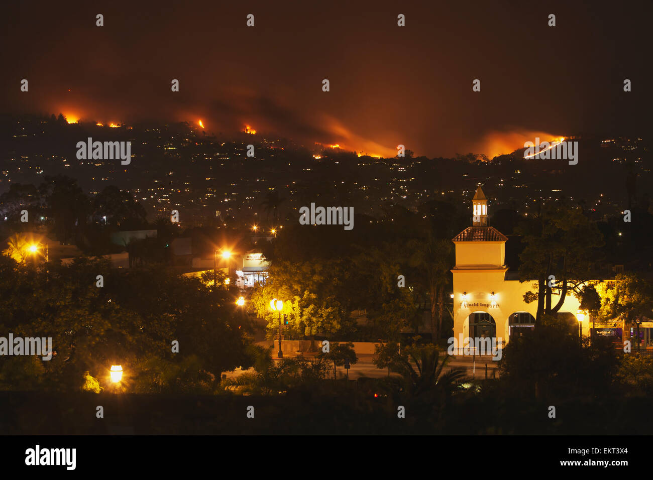 The Tea Fire burns a wide swath across the foothills just behind the ...