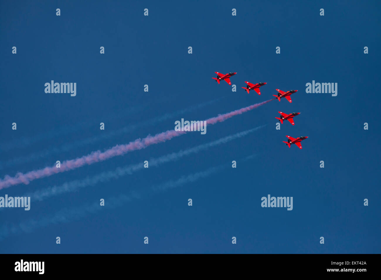 Red Arrows performing above Duxford Air Museum; Cambridgeshire, England ...