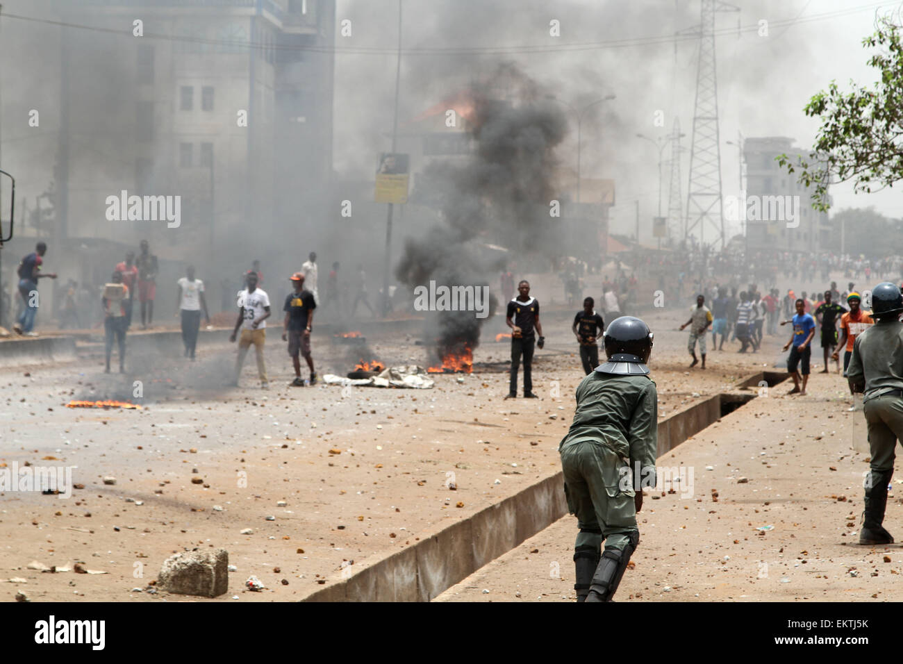 Conakry, Guinea. 13th Apr, 2015. Demonstrators confront security ...