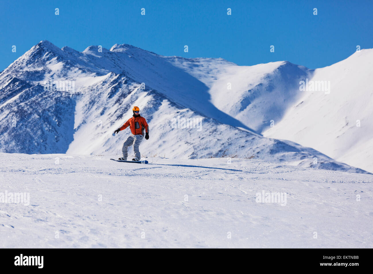 Caucasian male snowboarding in Anaktuvuk Pass, Winter, Gates of the ...