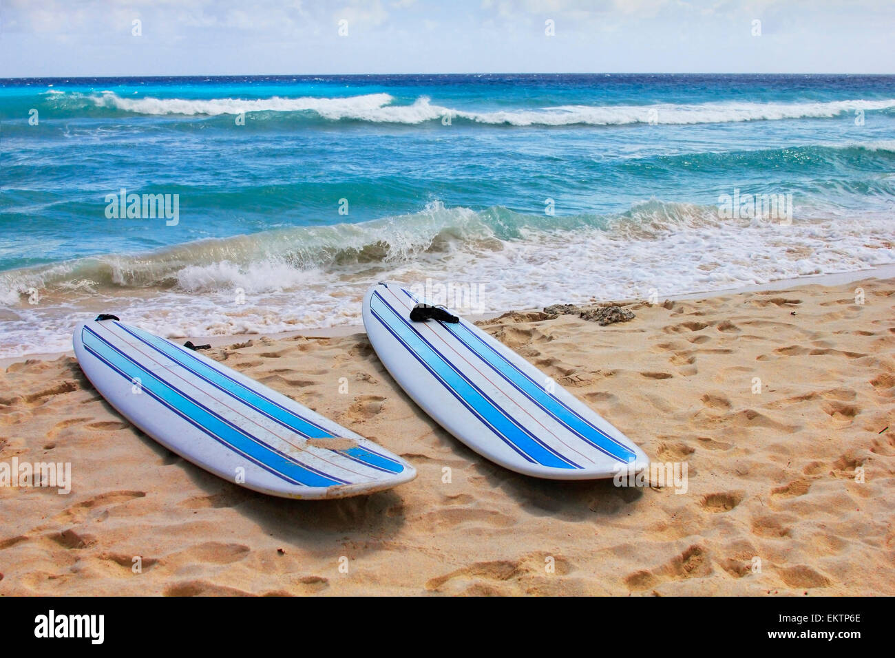 Surfboards at Dover beach on island Barbados on sandy shore by ocean ...