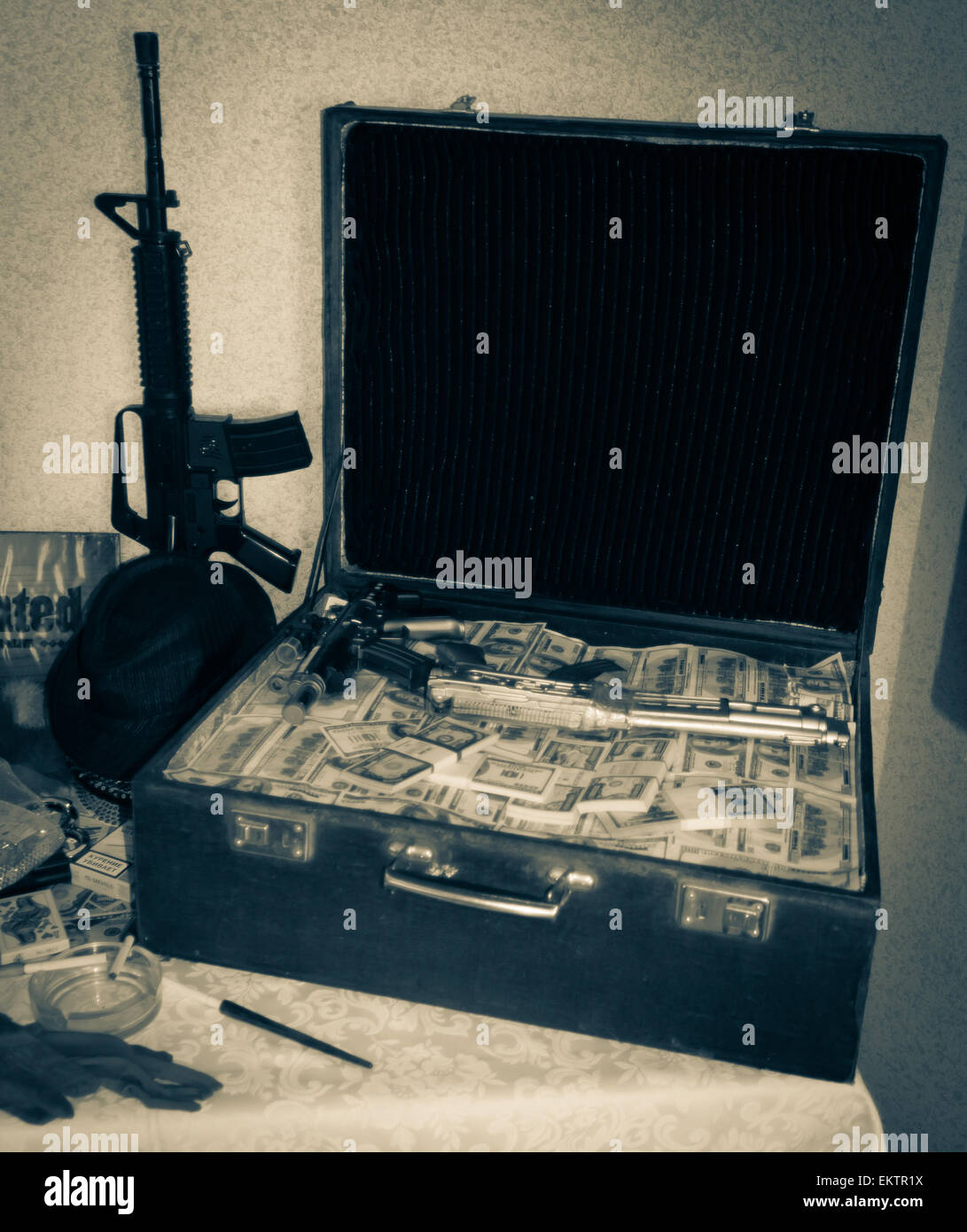 Large suitcase of money, weapons, and the plate is wanted Stock Photo ...