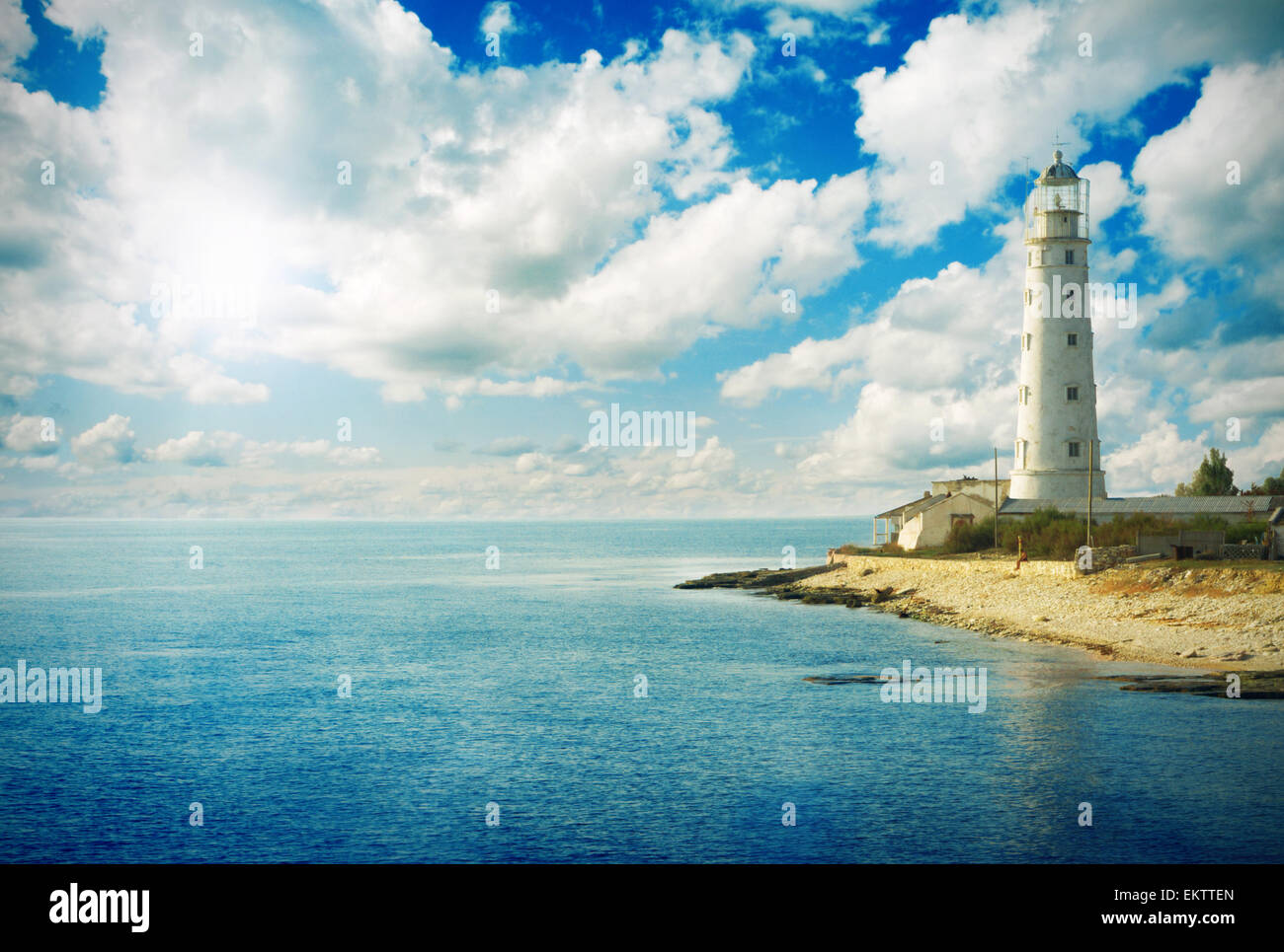 Old lighthouse on sea coast Stock Photo - Alamy